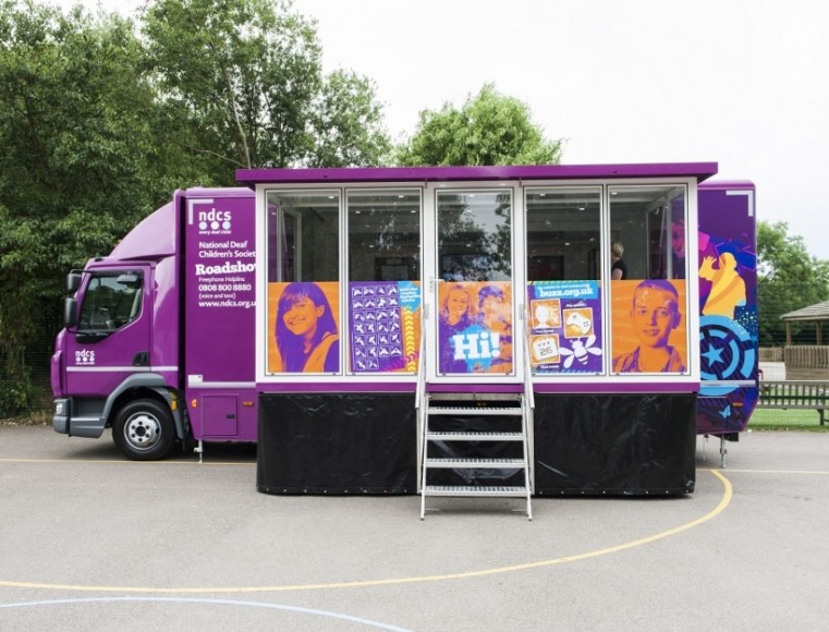 Everybody Wave at the Big Purple Bus - Culture Honey